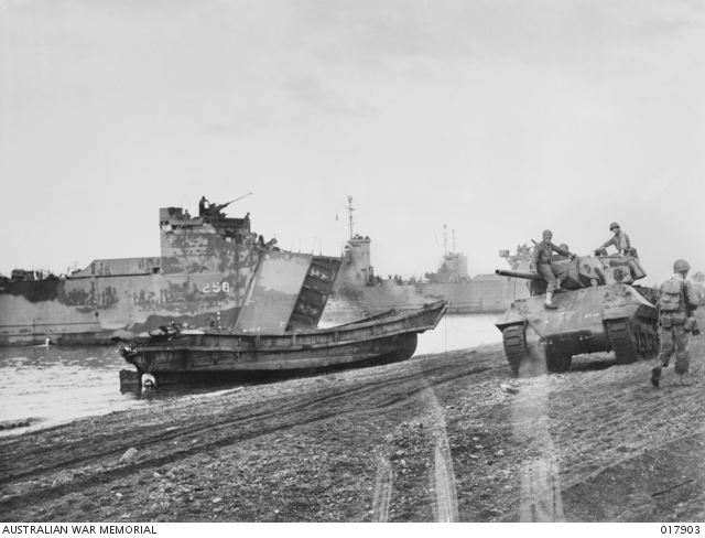 Ormoc Bay, Leyte, Philippines. A contrast in landing craft. A Japanese ...