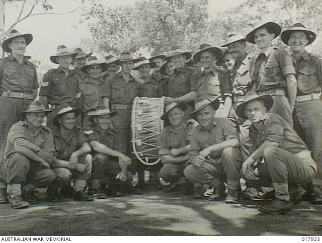 Queensland. Group portrait of diggers with their famous battalion drum ...