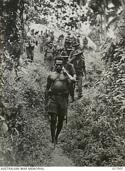 An Australian patrol setting out from Awit village in search of the ...