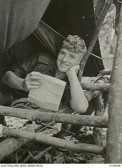 Aitape, New Guinea. Reason for that happy grin, appearing on the face ...