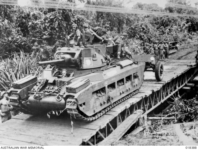 Bougainville. 30 March 1945. A Matilda tank, no. 19021, and trailer of ...