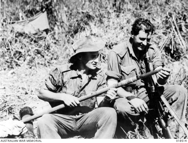 Borneo. May 1945. Two Australian diggers with a Japanese bayonet ...