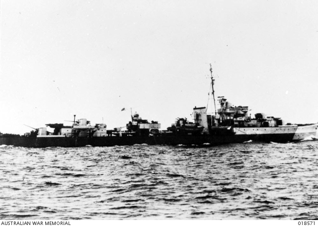 Starboard side view of the destroyer HMAS Quiberon (G81). She is armed ...