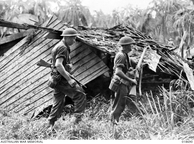 British North Borneo. 25 June 1945. Two infantrymen set out on patrol ...