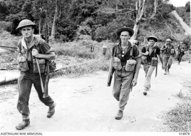 Borneo. 26 July 1945. Australian infantry move in on Samboja, thirty ...