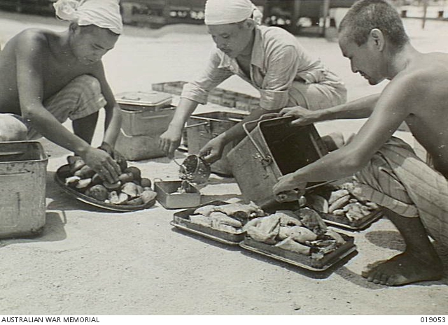 Morotai, Halmahera Islands. 1945. Japanese prisoner of war (POW) cooks ...
