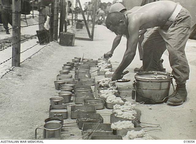 Morotai, Halmahera Islands. 1945. Japanese prisoner of war (POW) cooks ...