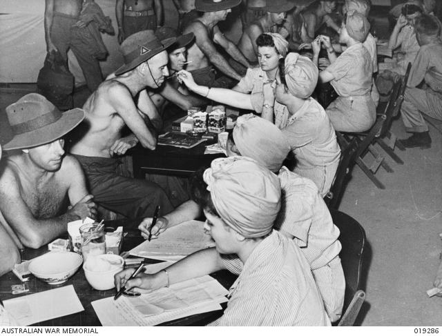 Yokohama, Japan. 1945. American nurses check the condition and medical ...
