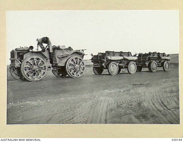 A captured Italian artillery tractor and trailers in the 26th ...