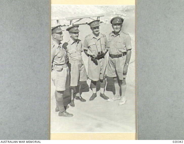 NX8 Major General Leslie James Morshead (second from left) with a group ...