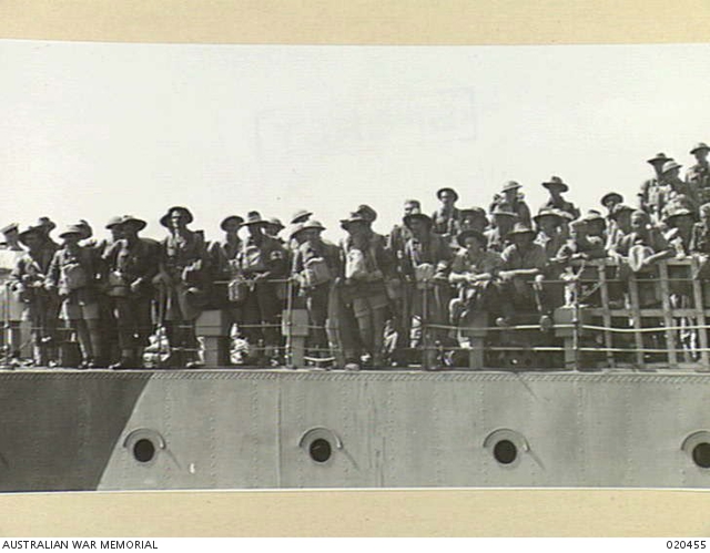 Members of the 24th Infantry Brigade lining the decks of a Royal Navy ...