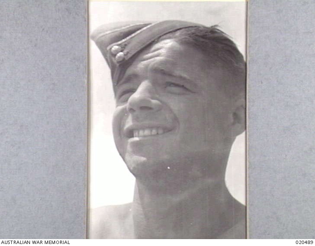 A smiling English soldier poses for the photographer in Tobruk ...