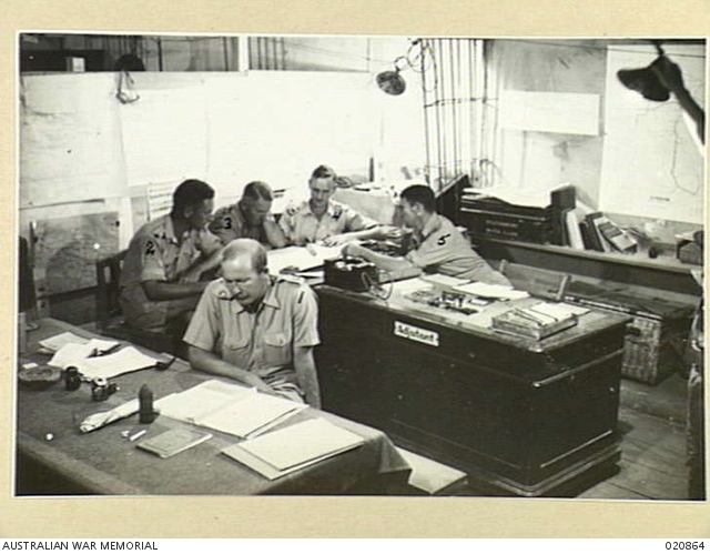 A group in the office of the Commanding Officer, 9th Division Signals ...