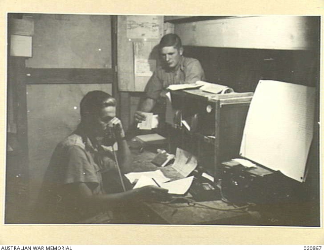 Signals clerks at work in the Signals Office, Headquarters, 9th ...