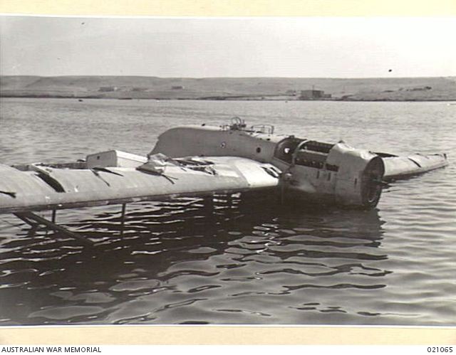 An Italian seaplane brought down in Tobruk harbour. | Australian War ...