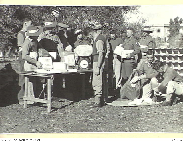 SYRIA. 1941-11. PARCELS BEING POSTED AT THE 21ST AUSTRALIAN INFANTRY ...