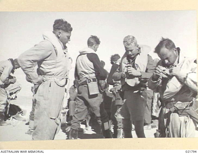 LIBYA. 1941-12. FIGHTER PILOTS OF NO. 3 SQUADRON, RAAF STANDING BY TO ...