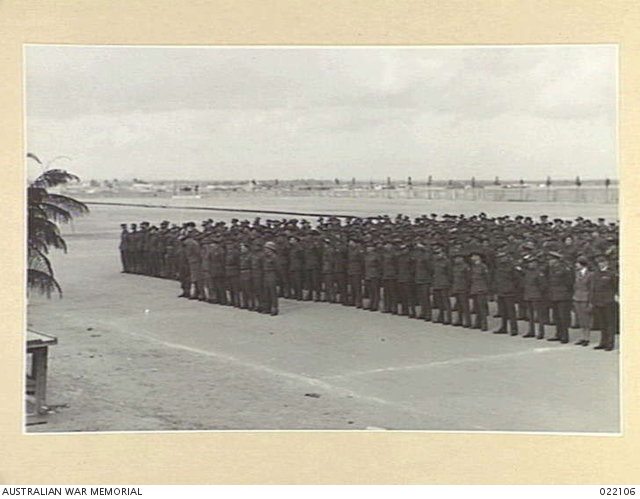 HELIOPOLIS, EGYPT. 1941-12-25. IN TRADITIONAL ARMY STYLE A PRIVATE HAD ...
