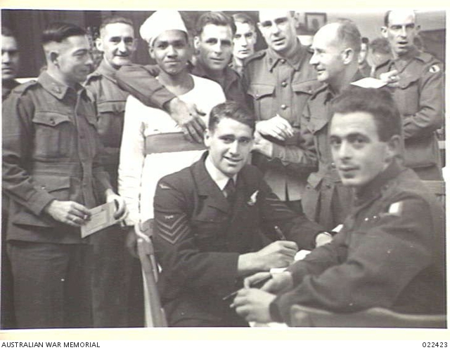 HELIOPOLIS, EGYPT. 1941-12-25. EXCHANGING AUTOGRAPHS DURING THE HQ A.I ...
