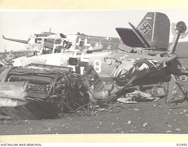 DERNA, LIBYA. 1941-12. WRECKED GERMAN AIRCRAFT ON THE AERODROME ...
