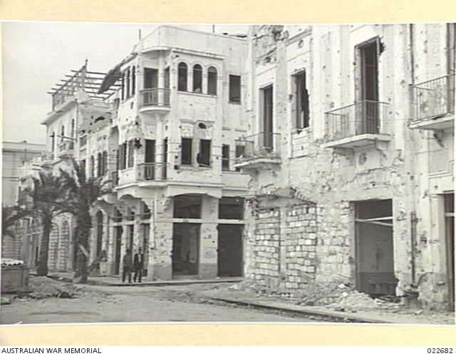 BENGHAZI, LIBYA. 1941-12-26. BOMB DAMAGED BUILDINGS AS THEY APPEARED TO ...