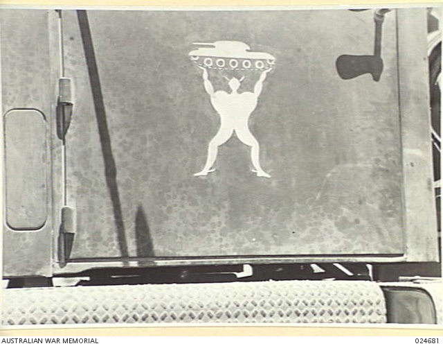 UNIT EMBLEM OF A TANK RECOVERY UNIT ON THE CABIN DOOR OF A TRUCK ...