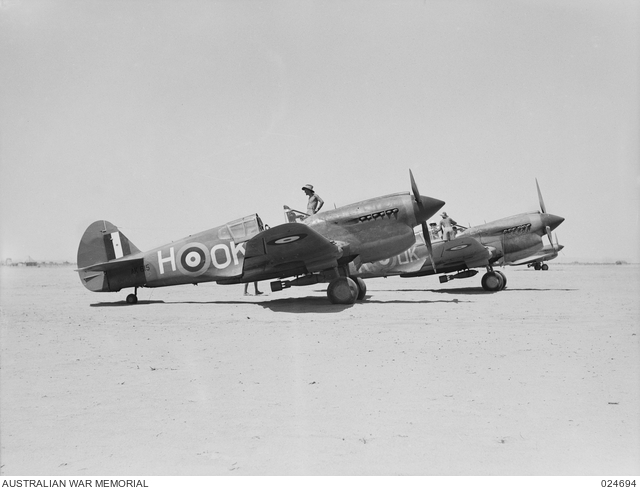 KITTYHAWK FIGHTER-BOMBER PLANES ON THE AIRFIELD OF NO. 450 SQUADRON ...