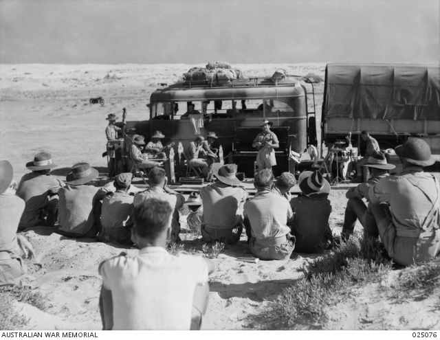 EL ALAMEIN, EGYPT. 1942-10. THE 9TH AUSTRALIAN DIVISIONAL CONCERT PARTY GIVING AN OPEN AIR ...