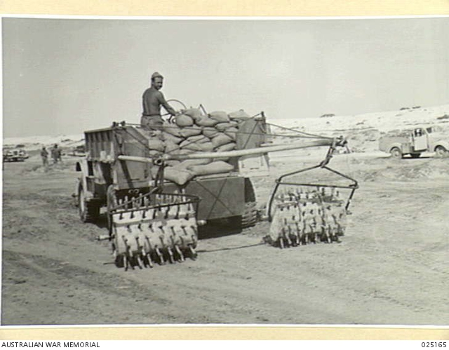 WESTERN DESERT, EGYPT. 1942-10. ANTI-MINE ROLLERS FITTED TO TRUCK ...