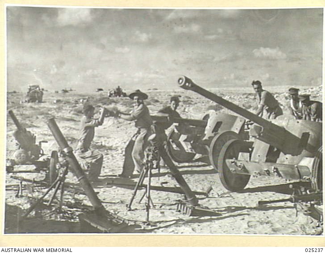 WESTERN DESERT, EGYPT. 1942-11-02. HAUL OF ENEMY GUNS AND EQUIPMENT ...