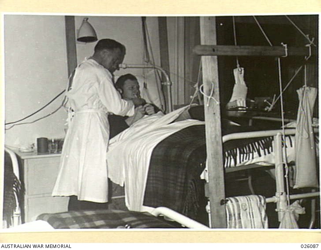 HEIDELBERG, AUSTRALIA. 1942-08. INCAPACITATED, BUT HAPPY. A PATIENT AT ...