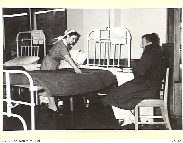 SYDNEY, NSW. 1942-09-08. A NURSE OF THE VOLUNTARY AID DETACHMENT MAKES ...