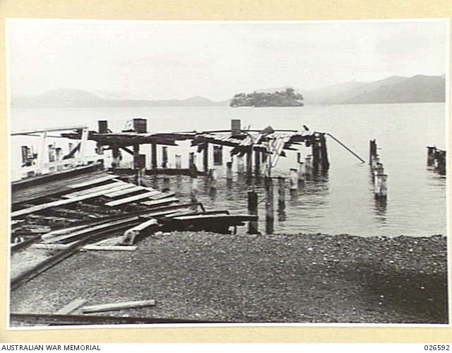 THE JETTY AT SAMARAI ISLAND DESTROYED BY AUSTRALIAN FORCES BEFORE ...