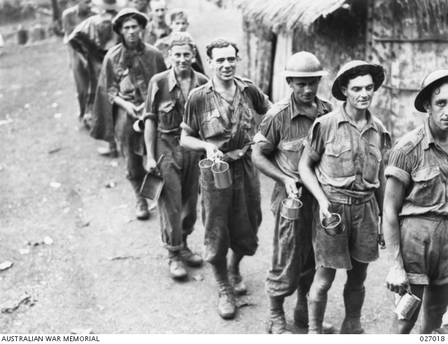 PAPUA, NEW GUINEA. 1942-10. MEMBERS OF THE 2/27TH AUSTRALIAN INFANTRY ...