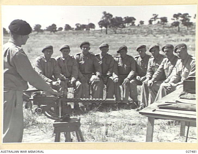 Unidentified tank crewmen attending a lecture on the Browning, Model ...