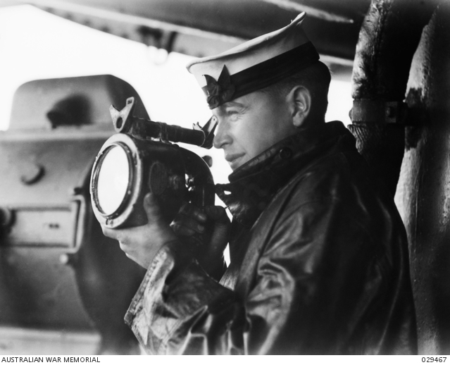 HMAS AUSTRALIA, AT SEA. 1943-02. SIGNALMAN A. WILSON, OF HMAS AUSTRALIA ...