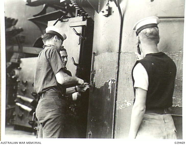 HMAS AUSTRALIA, AT SEA. 1943-02. FOLLOWING THE LOSS OF HMAS CANBERRA ...
