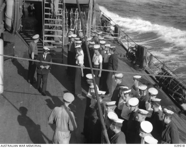 HMAS AUSTRALIA, AT SEA. 1943-02. TRAINING CLASSES MUSTERING FOR ...