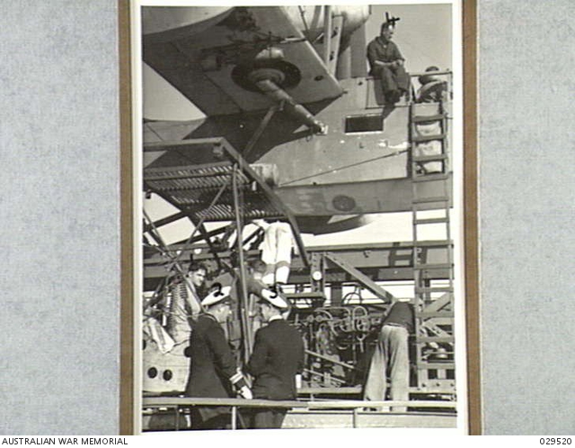 HMAS AUSTRALIA, AT SEA. 1943-02. THE RAAF DETACHMENT AND THE CATAPULT ...