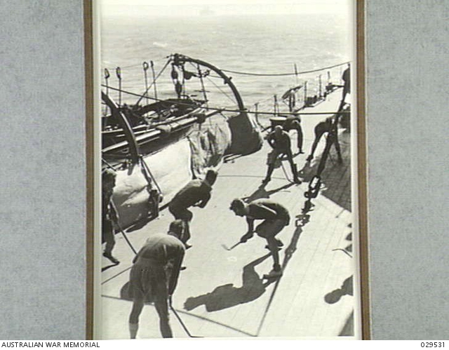 HMAS AUSTRALIA, AT SEA, 1943-02. MEMBERS OF THE CREW OF HMAS AUSTRALIA ...
