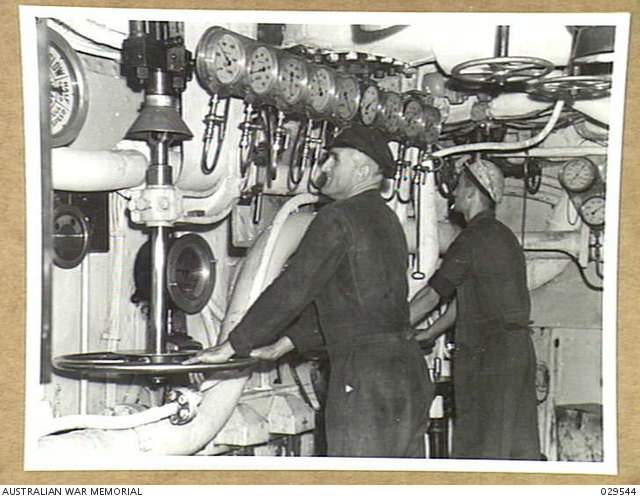HMAS AUSTRALIA, AT SEA. 1943-02. A SCENE INSIDE THE ENGINE-ROOM OF HMAS ...