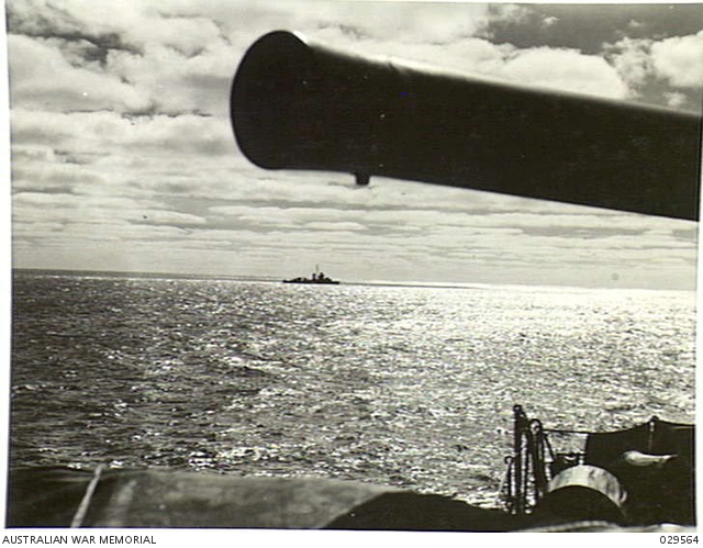 HMAS AUSTRALIA, AT SEA. 1943-02. THE AMERICAN DESTROYER USS HENLEY SEEN ...