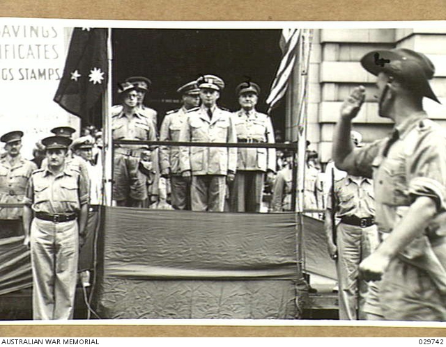 PERTH, WA. 1943-03-18. CLOSE-UP OF SALUTING BASE AS MEN OF THE 5TH ...