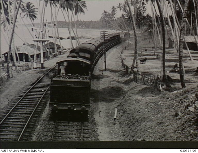 View from the Grand Hotel, Mount Lavinia, of a train at the time of the ...