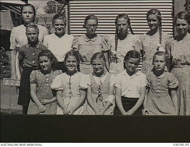 Tatura, Australia. 13 February 1943. Family groups of German internees ...