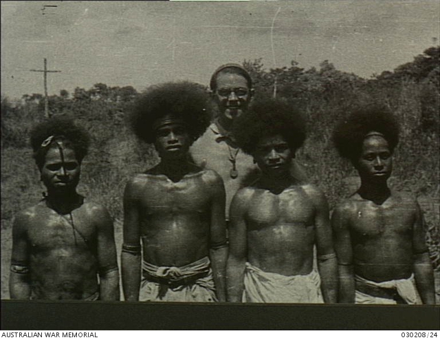 Soputa, Papua. 22 December 1942. Four Papuan `Fuzzy-Wuzzies' with a ...