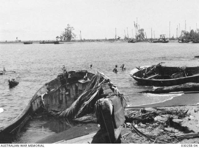 Sanananda, Papua. January 1943. Japanese barges derelict on the beach ...