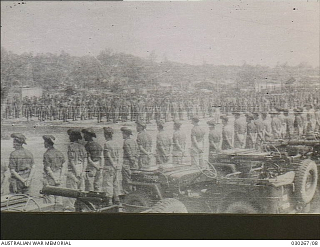 Troops of the 2/13th Australian Infantry Battalion parade for ...