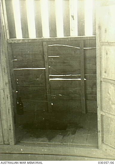 Bakli Bay, Hainan Island. c. 28 August 1945. The Dutch latrine in one ...
