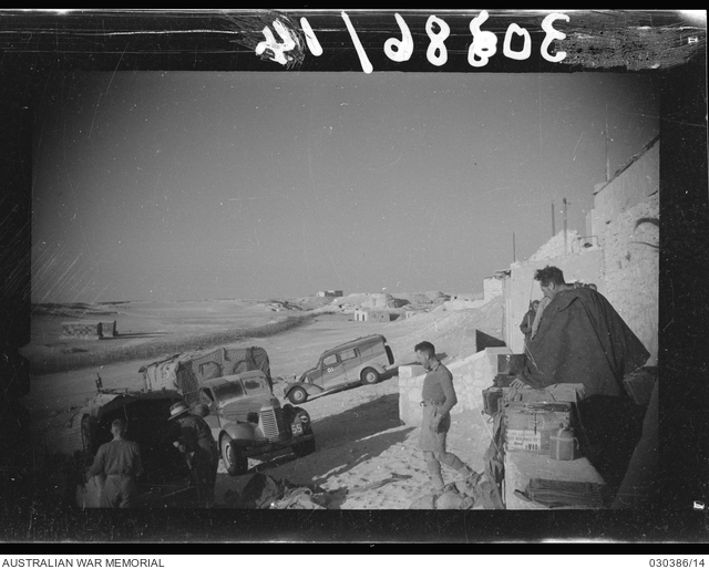 Giarabub, Libya. March 1941. Lieutenant Colonel J. E. G. Martin (hands ...